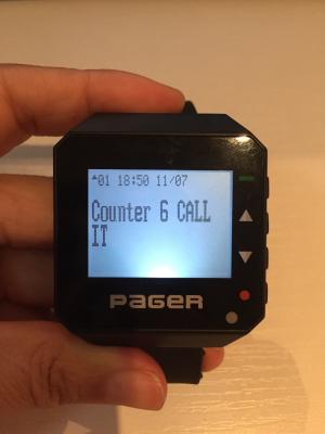China Customize cheap wireless alphanumeric wrist watch and button pager system used for shopping mall or factory for sale