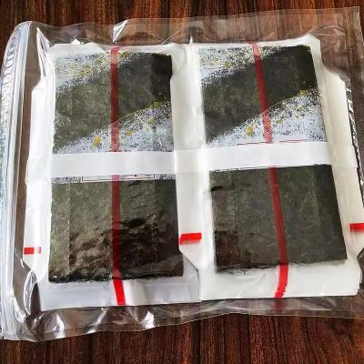 中国 トライアングルオニギリノリと蒸した海藻 トライアングルラバー アルガ プラスチックパッケージ 販売のため