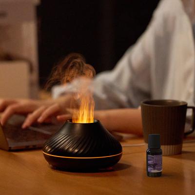 China 7 Color LED Ultrasonic Essential Oil Diffuser Wave Design Cordless Oil Diffuser For Office for sale