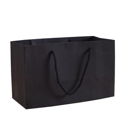China Hot stamping pure black paperboard clothes gift packaging shopping bag for sale