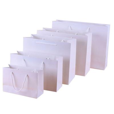 China Pure white clothes packaging paper bag accept personal logo printing for sale