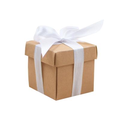 China Kraft paper rigid cover cheap folding candy box with bowknot ribbon decorate for sale