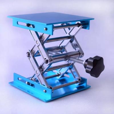 Cina ascensore di forbici del laboratorio dell'ossido di alluminio dell'ascensore di forbici della Tabella del supporto del laboratorio di 150x150mm in vendita
