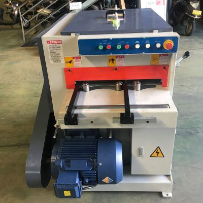 Cina MJ141-0650 Automazione orizzontale Taglio di legno Multi Rip Trimming Saw Machine per segatura in vendita