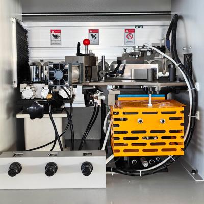 Cina Funzione di incollaggio PM50B Pannelli a base di legno Macchine per la banda di bordo Trimmer Auto Edge Bander con pre-mellaggio in vendita