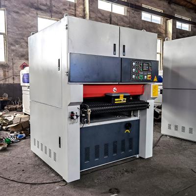 China Máquina de lixagem por correia abrasiva de 64kW para polir folhas de aço inoxidável à venda