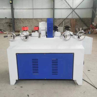 Cina Macchina per la lavorazione del legno a doppia testa per bastoncini rotondi da 30 a 100 mm con disposizione verticale in vendita
