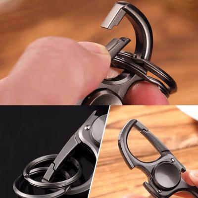 China Unisex Metal Keychain Bottle Opener Fidget Spinner Toy for Anxiety and Stress Relief for sale