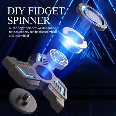 Cina Gioco a mano con le dita in metallo per adulti adolescenti bambini ADHD Fidget Spinner Puzzle anti-ansia in vendita