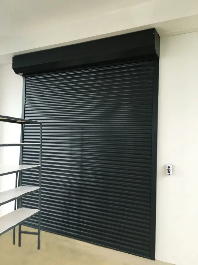 Close-up view of aluminum roller shutter door mechanism