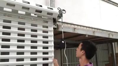 China Custom Made Aluminum Roller Shutter Door with Max Width 7200 mm and Max Height 7000 mm for Enhanced Security for sale