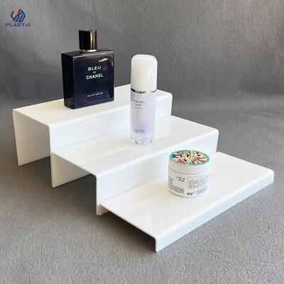 China Customized Shape Acrylic Display Stand Clear Acrylic Risers For Shopping Malls for sale