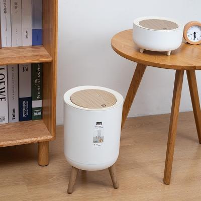 China Wood Grain Round Household Desktop Mini Simple Large-capacity Wastepaper Basket Plastic High-footed Trash Can for sale