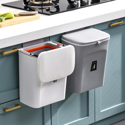 China Creative Sliding Lid Wall Hanging Trash Can Kitchen Cabinet Door Hanging Storage Plastic Household Trash with Lid for sale