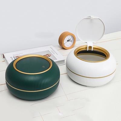 China Wholesale Round Desktop Mini Trash Can Household Small Storage Bucket with Lid Light Luxury Plastic Car Hygiene Bucket for sale