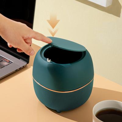 China Desktop Trash Can Household Living Room Press Paper Basket Office Pail Paper Basket Dormitory Small Paper Basket with Cover for sale