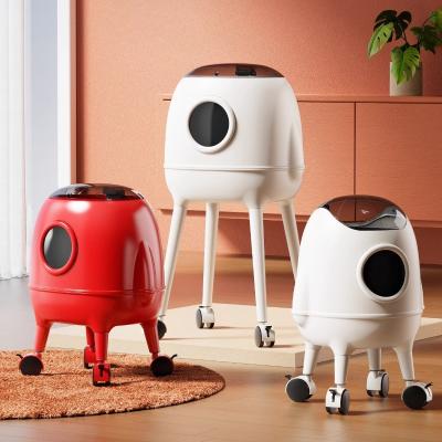 China Creative Rocket-shaped Trash Can with Large Capacity and Movable Pulley Wheels for Bedroom Living Room for sale