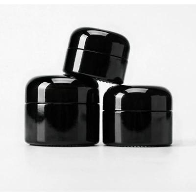 China Glass Black Glass Jars Eco Friendly Reusable Packaging Containers Suitable for Cosmetics Spices and Candle Preservation for sale