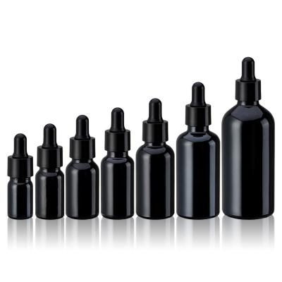 China Storage For Liquids Essential Oils Black Tinted Glass Bottle Varies Depending On Size Containers For Cosmetic Liquids And Natural Extracts from 5ml to 100ml for sale