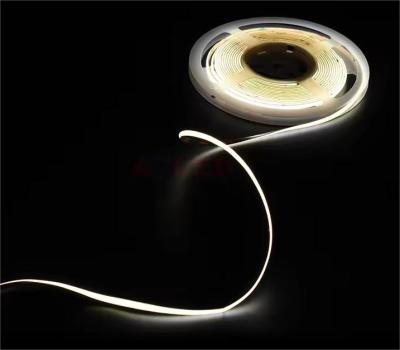中国 超薄幅 3mm 90Ra COB LED ストライプ 折りたたみ可能な LED テープ 12V ドットレス フリップチップ 3000K 超薄柔軟 販売のため