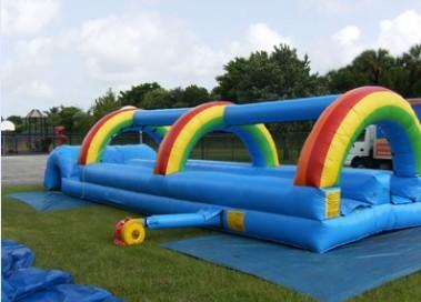 China inflatable tropical slide ,giant inflatable slip rainbow inflatable slip slide for sale