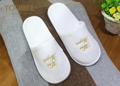 China One Size Fits Most Coral Fleece Disposable Hotel Slippers with Various Logo Choices for sale