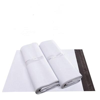 China Custom Logo Self Adhesive Waterproof PE Matte Black Clothes Packaging Poly Mailer Mailing Shipping Bag for sale
