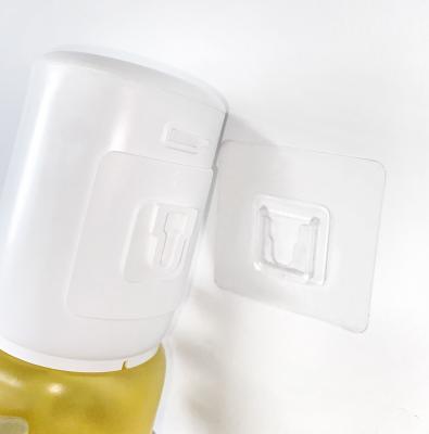 Cina Gli accessori di plastica del bagno dell'ABS mette i ganci adesivi della parete parteggiati doppio di 60mm in vendita