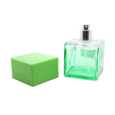China Silver Spray Custom Glass Perfume Bottles , 100ml Glass Perfume Bottle Green Cap for sale