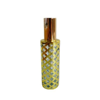 China A garrafa de perfume de vidro recarregável da cor dourada, personaliza garrafas da fragrância da forma mini à venda