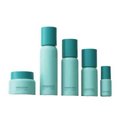 China Custom opaque green skincare containers PETG Round shoulder airless pump bottles for sale