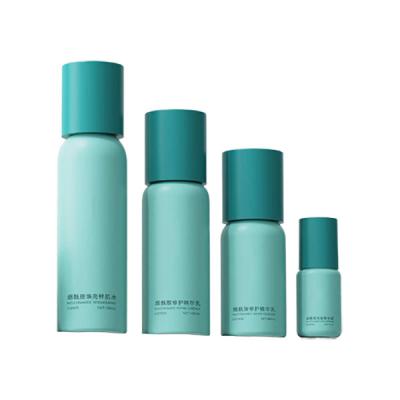 China Custom opaque green skincare containers PETG Round shoulder airless pump bottles for sale