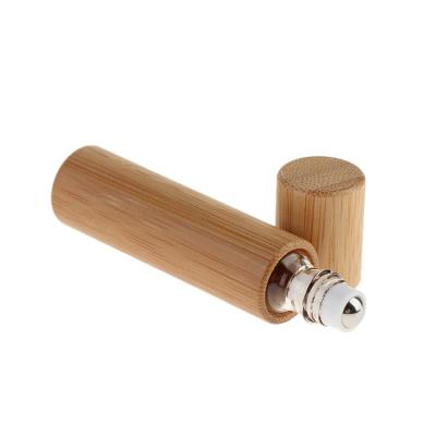 China Luxo 10ml Rolo de bambu em garrafa Óleo essencial Perfume Roller de vidro de bambu natural tampa e vidro âmbar à venda