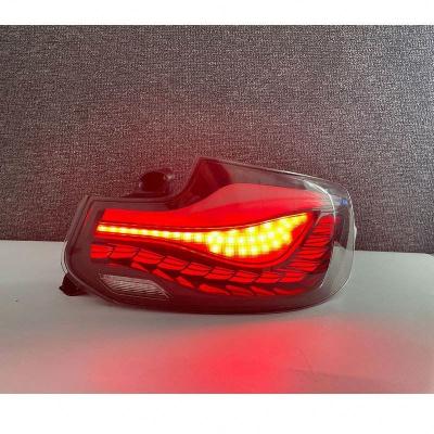 China 12V Archaic LED Taillight For BMW M2C F22 F23 F87 218 220i Tail Light Rear Lamp LED DRL Running Signal for sale