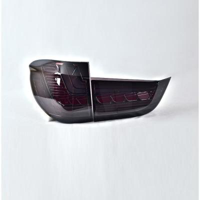 Cina Luce posteriore a LED a scala di drago dinamico modificata per BMW X5 in vendita