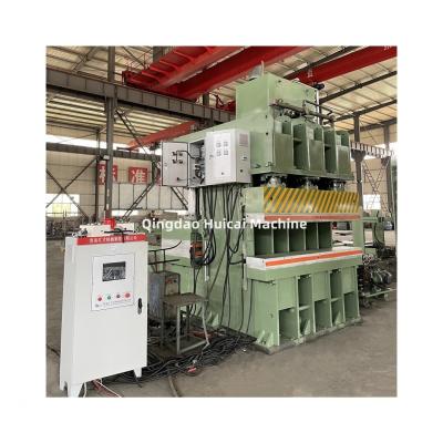 China Nominale gietkracht MN 1,20 MN Timing Belt Vulcaniseringsmachine Te koop