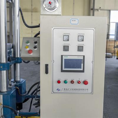 中国 2.2kW メインモーターパワー 電気加熱付きゴム床マット vulkanisingマシン 販売のため