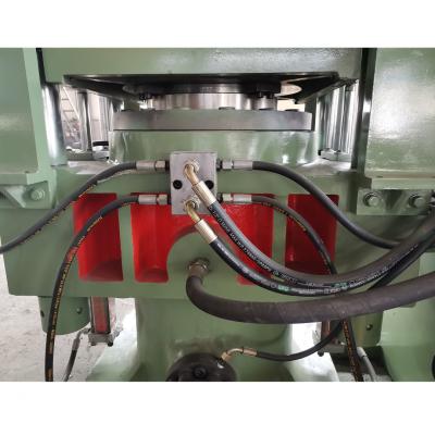 Cina 220V 380V 450V Rubber Molding Vulcanizing Machine con riscaldamento a vapore ed elettrico in vendita