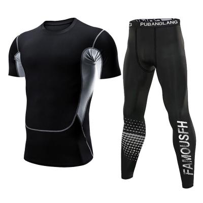 China Adultos Calças de Treino Apertadas Secagem Rápida Traje Desportivo Impresso Roupas Desportivas De Corrida Calças curtas à venda