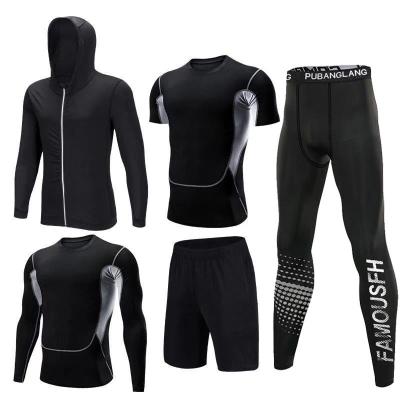 China Adultos Calças de Treino Apertadas Secagem Rápida Traje Desportivo Impresso Roupas Desportivas De Corrida Calças curtas à venda