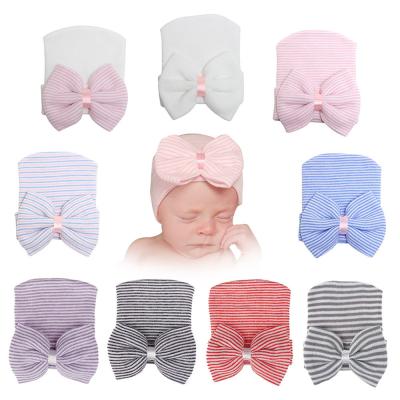 China 2022 Knitted Wool Baby Hat with Big Bow in Customized Color and Pattern Knitted for sale