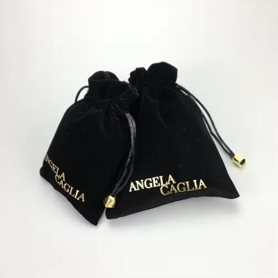 China Portable Black Flocking Gold Printing Velvet Pouch for Customized Jewelry Packaging for sale