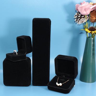 China Custom Logo Stock Velvet Black Jewelry Boxes with Printing and Luxury Design for sale
