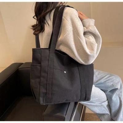 China Einfache Wiederverwendbare Farben Große Baumwoll-Toote-Tasche mit Reißverschluss für Reisen und Ausreisen zu verkaufen