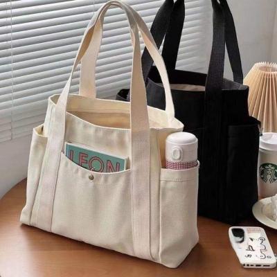 China Einfache Wiederverwendbare Farben Große Baumwoll-Toote-Tasche mit Reißverschluss für Reisen und Ausreisen zu verkaufen