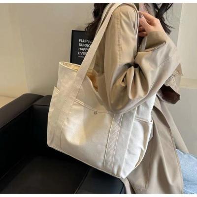 China Einfache Wiederverwendbare Farben Große Baumwoll-Toote-Tasche mit Reißverschluss für Reisen und Ausreisen zu verkaufen