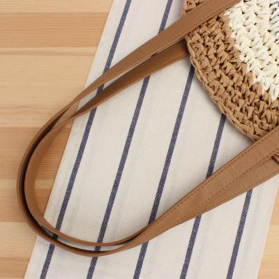 China Summer Half Round Ethnic Style Saddle Straw Woven Beach Handmade Rattan Bag for Unisex for sale