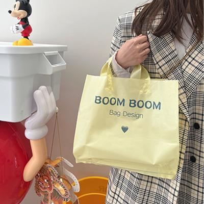 China Custom Logo Accepted Soft Loop Handles Tote Shopping Plastic Bag for Clothing Packaging for sale
