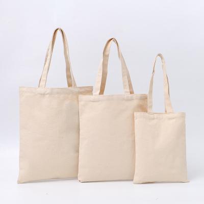 中国 大型綿のキャンバス トートバッグ ポケットとジッパー ストロークのパターン 販売のため