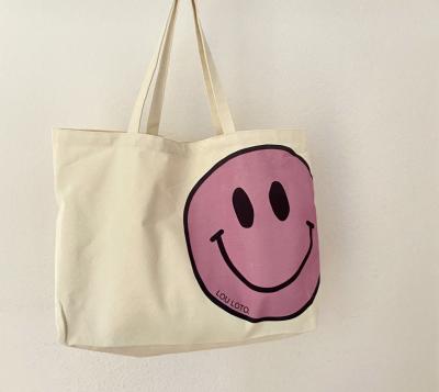 中国 大型綿のキャンバス トートバッグ ポケットとジッパー ストロークのパターン 販売のため